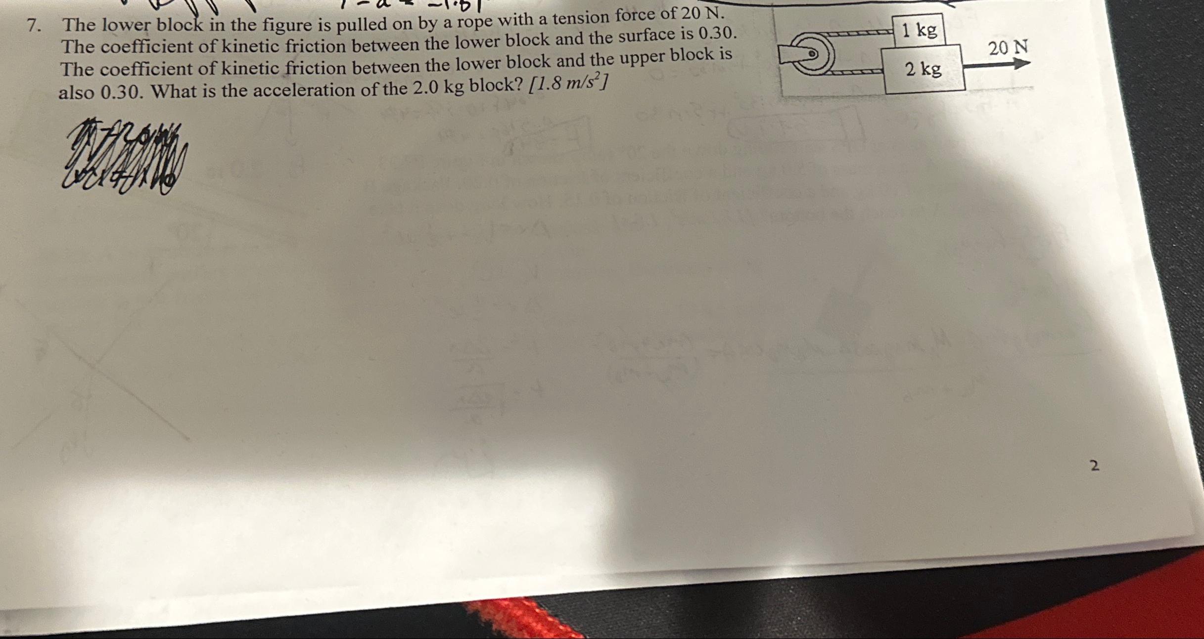 Solved The lower block in the figure is pulled on by a rope | Chegg.com