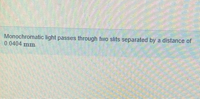 Solved Monochromatic light passes through two slits | Chegg.com