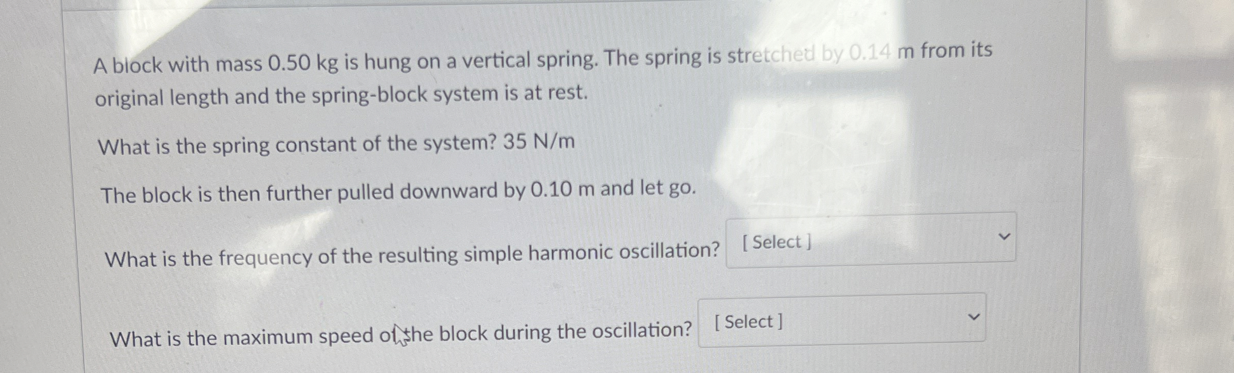 Solved A block with mass 0.50 ﻿kg is hung on a vertical | Chegg.com