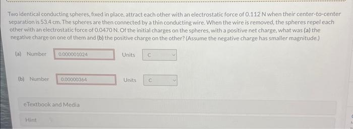 Solved Two identical conducting spheres, fixed in place, | Chegg.com