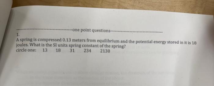 Solved 1. A spring is compressed 0.13 meters from | Chegg.com