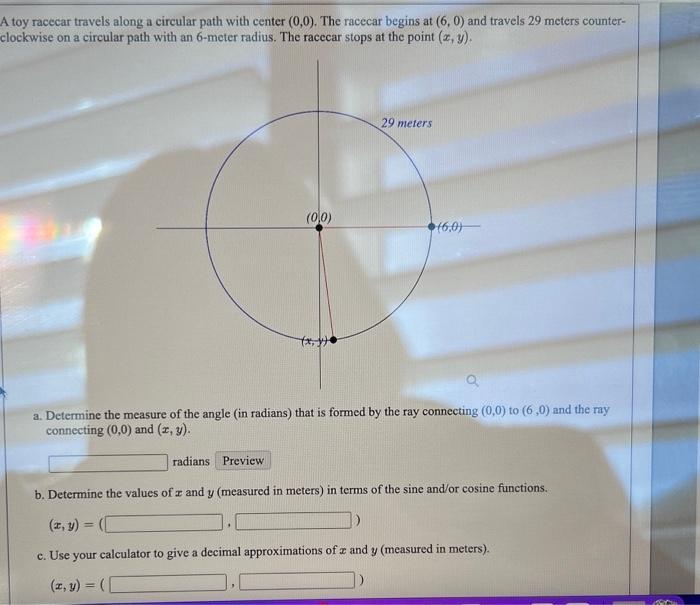 Solved A toy racecar travels along a circular path with | Chegg.com