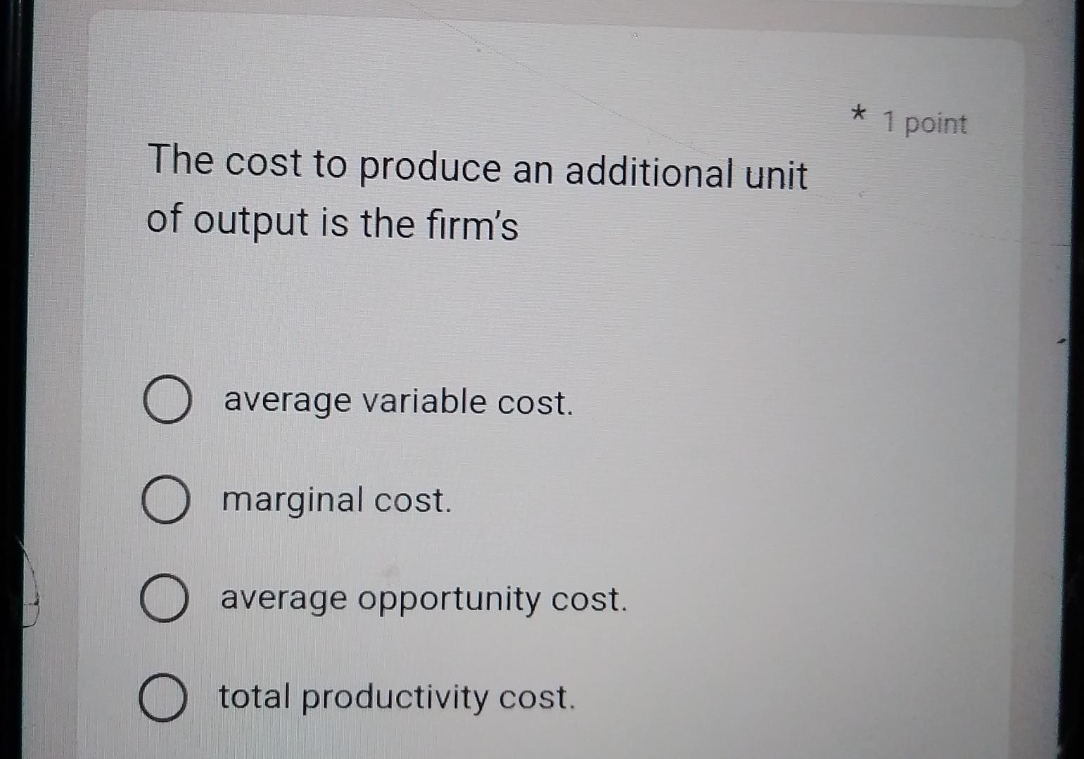 Solved 1 ﻿pointThe cost to produce an additional unit of | Chegg.com