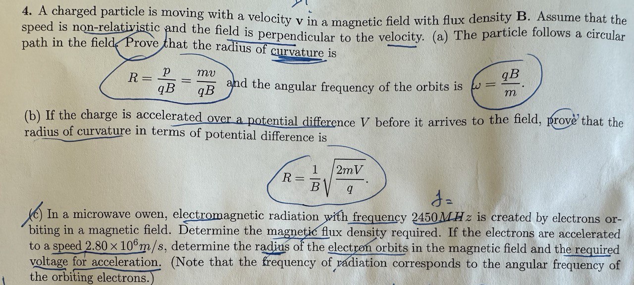 Solved A charged particle is moving with a velocity v ﻿in a | Chegg.com