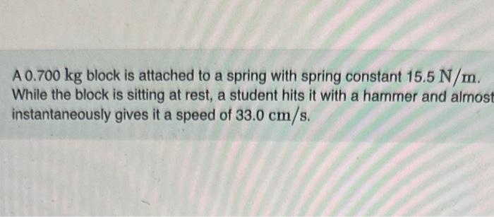 Solved A 0.700 kg block is attached to a spring with spring | Chegg.com