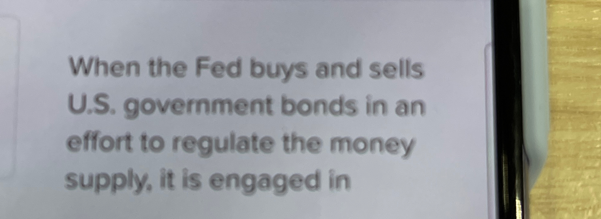 Solved When the Fed buys and sells U.S. ﻿government bonds in | Chegg.com