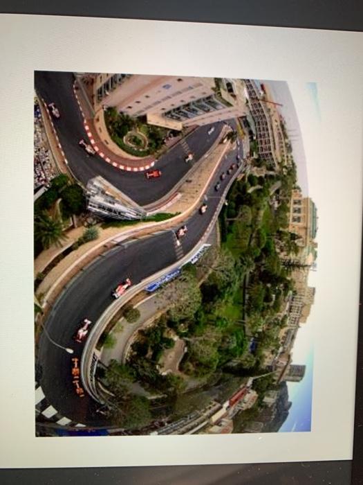 Solved You are on a turn on the Monaco race track, the race | Chegg.com