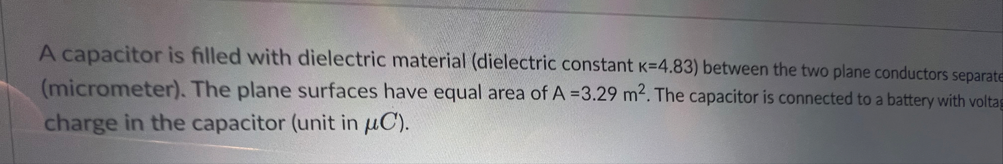 Solved A capacitor is filled with dielectric material | Chegg.com