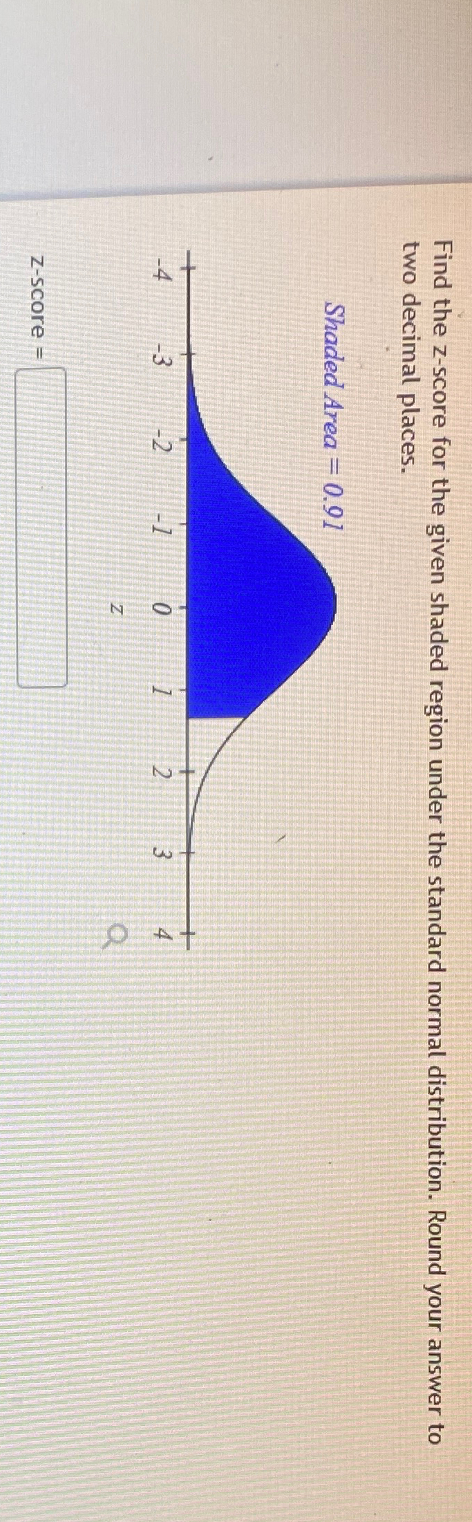 Solved Find the z-score for the given shaded region under | Chegg.com