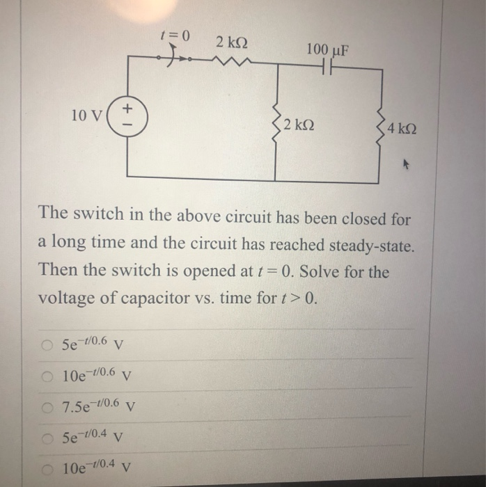 Solved 2 ks2 100 uF 10 V 4 km2 The switch in the above | Chegg.com