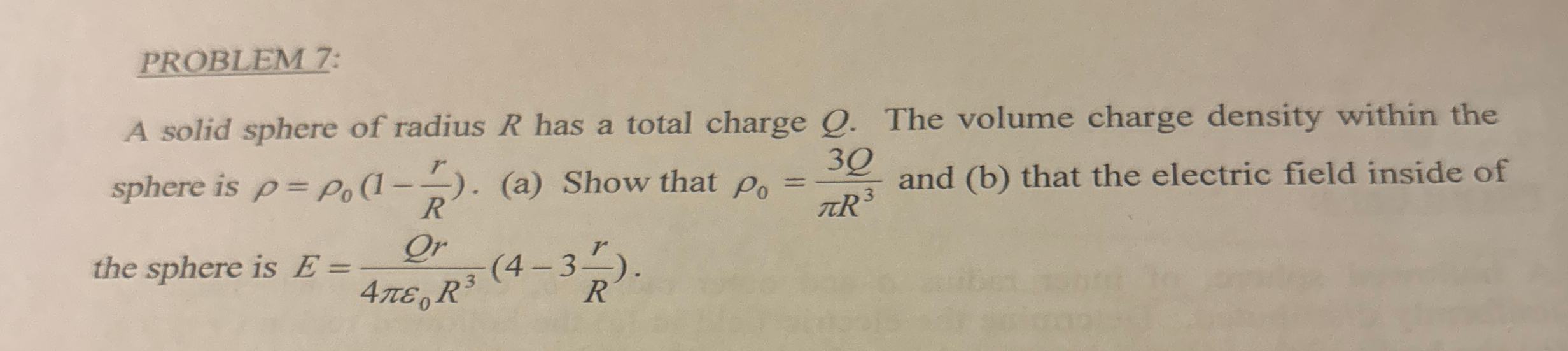 Solved PROBLEM 7:A solid sphere of radius R ﻿has a total | Chegg.com