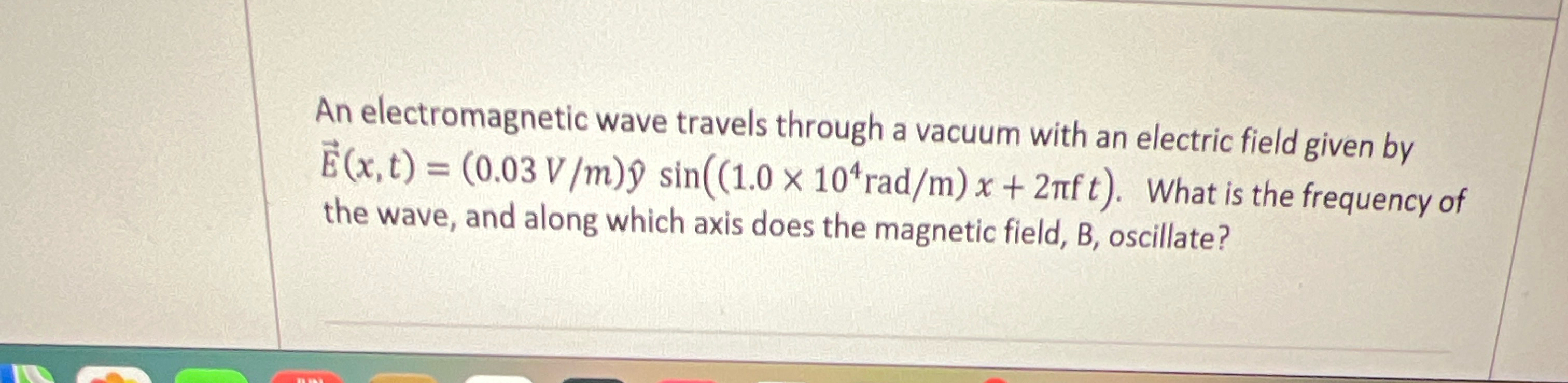 Solved An electromagnetic wave travels through a vacuum with | Chegg.com