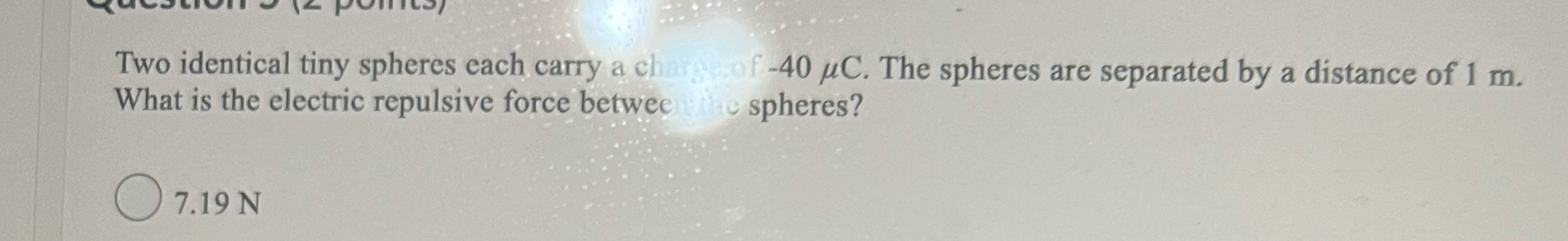 Solved Two identical tiny spheres each carry a chaf of | Chegg.com