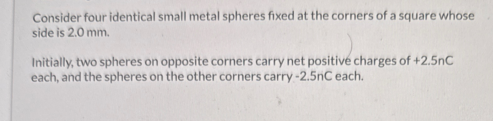 Solved Consider four identical small metal spheres fixed at | Chegg.com