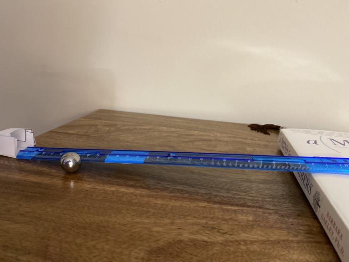 Solved A steel ball rolls down a ruler from 3 different | Chegg.com