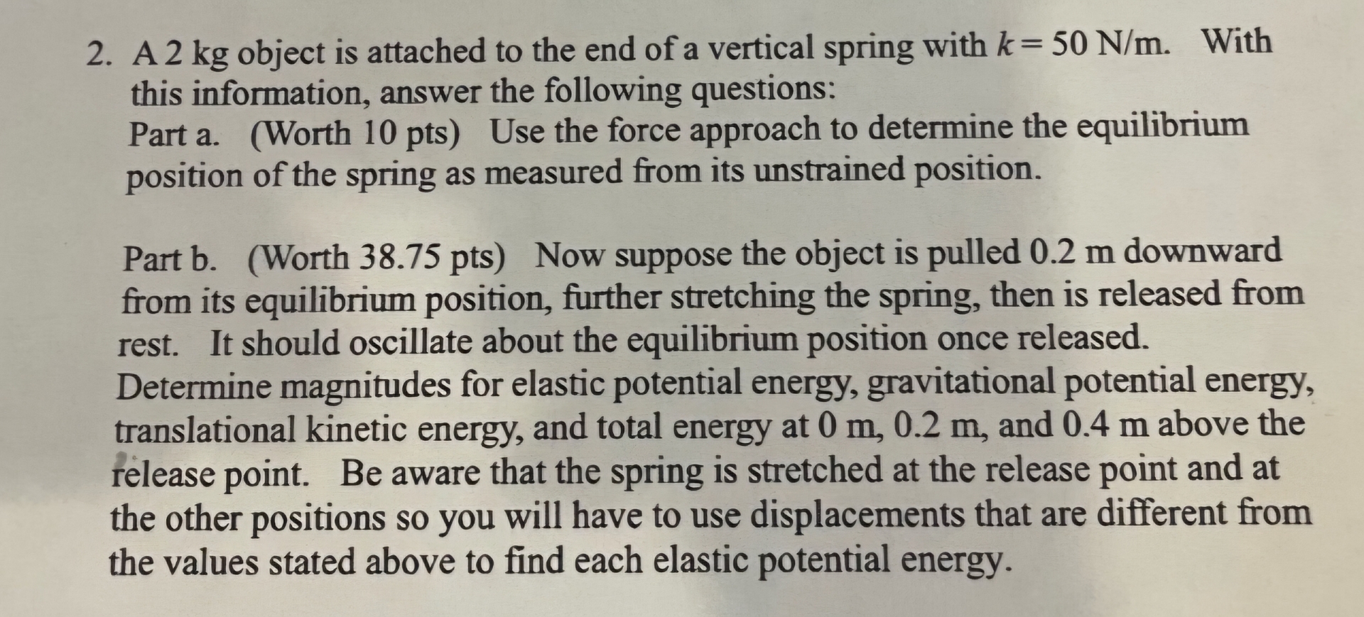 Solved A 2 ﻿kg object is attached to the end of a vertical | Chegg.com