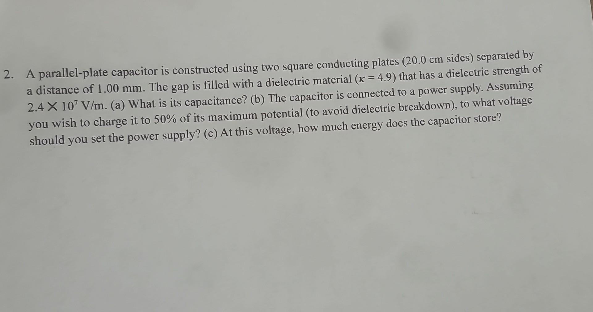 Solved A parallel-plate capacitor is constructed using two | Chegg.com