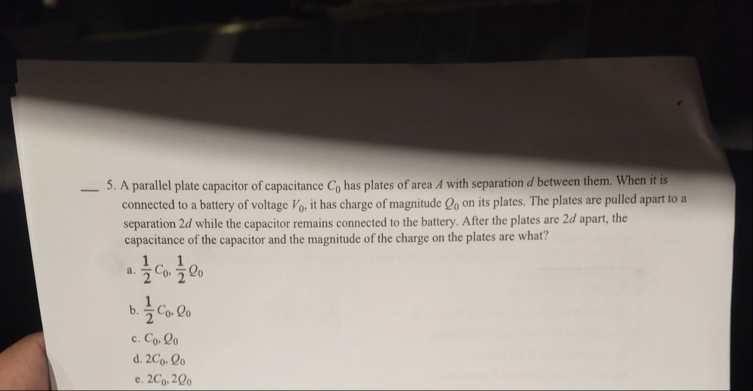 Solved q, 5. ﻿A parallel plate capacitor of capacitance C0 | Chegg.com