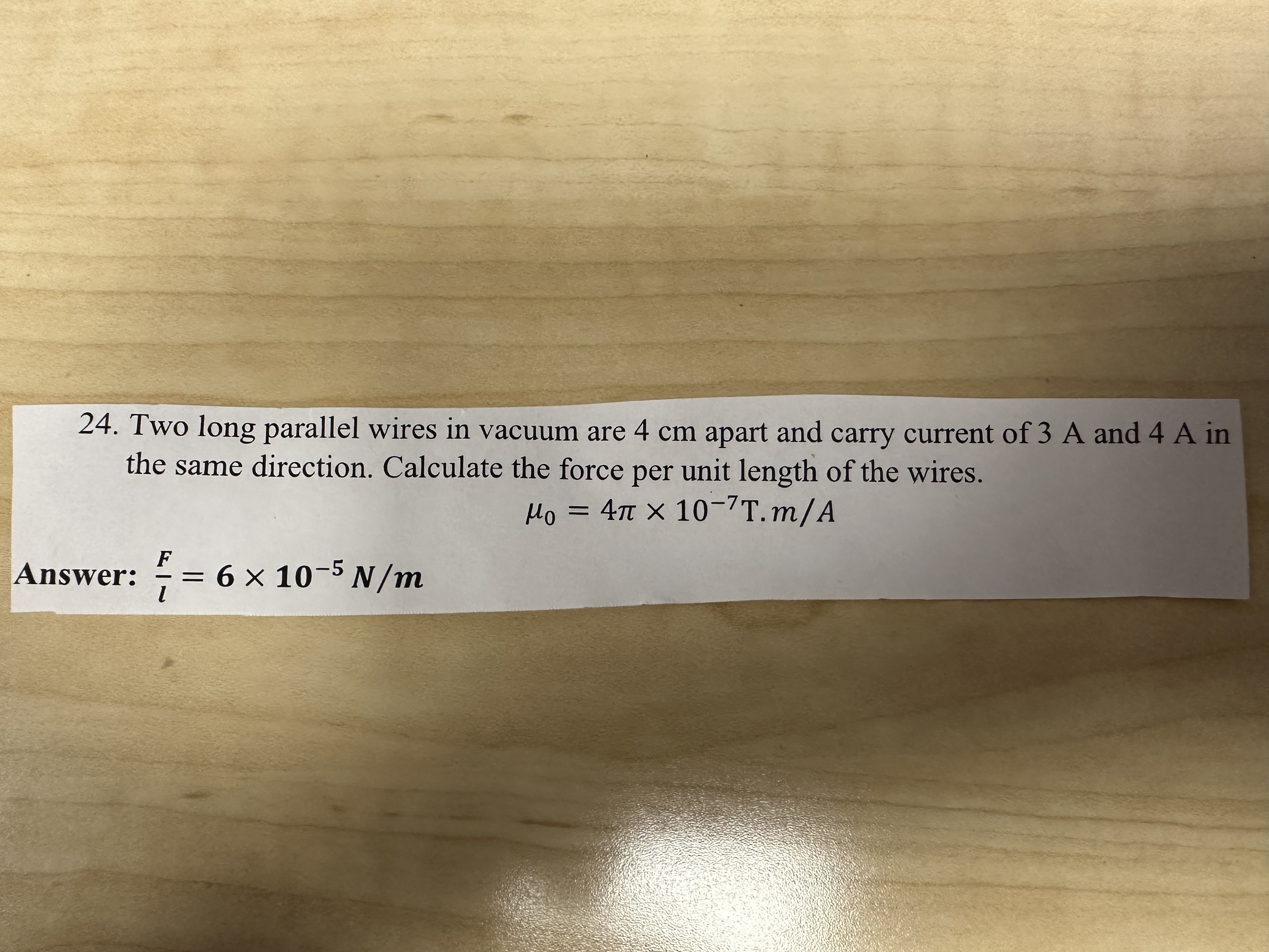 Solved Two long parallel wires in vacuum are 4cm ﻿apart and | Chegg.com