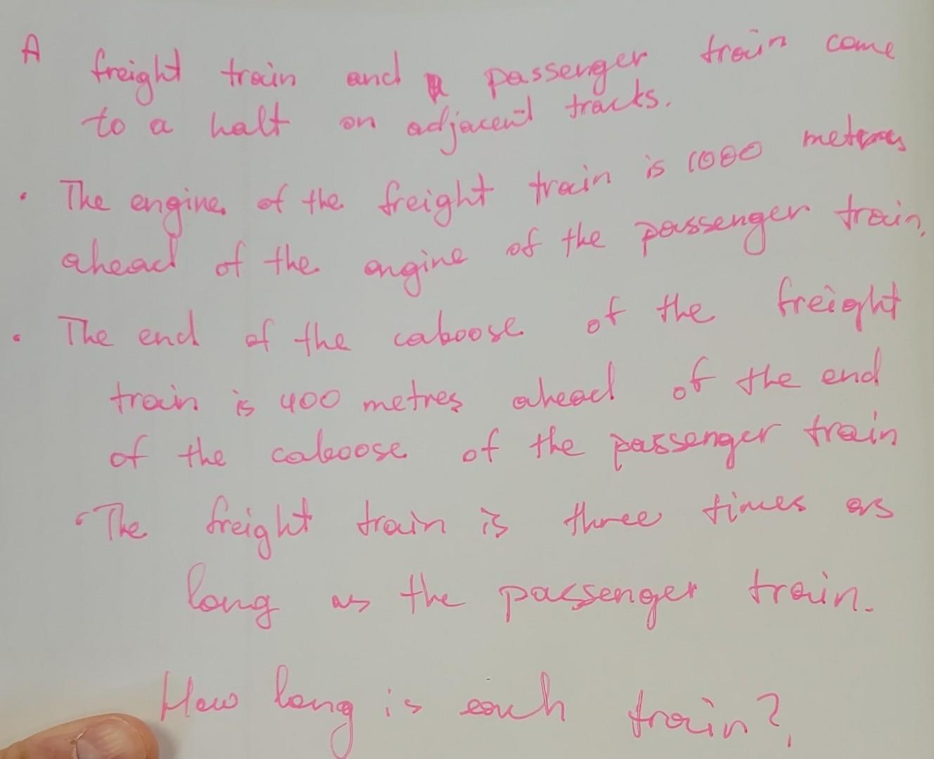 Solved A freight train and passenger troin come to a halt on | Chegg.com