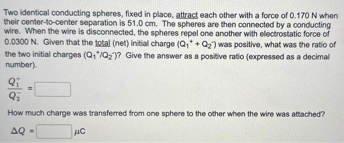 Two identical conducting spheres, fixed in place, | Chegg.com