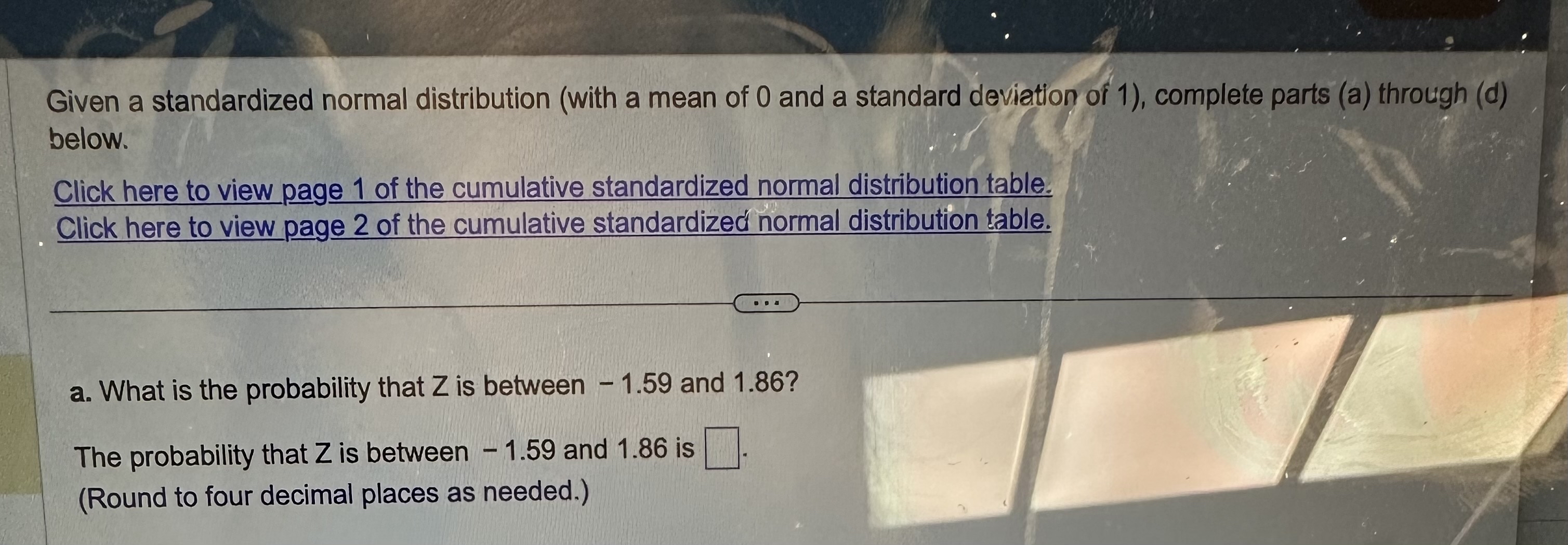 Solved Given a standardized normal distribution (with a mean | Chegg.com