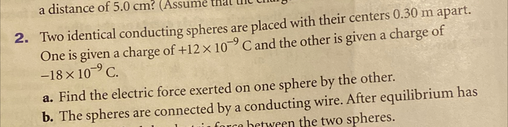 Solved Two identical conducting spheres are placed with | Chegg.com