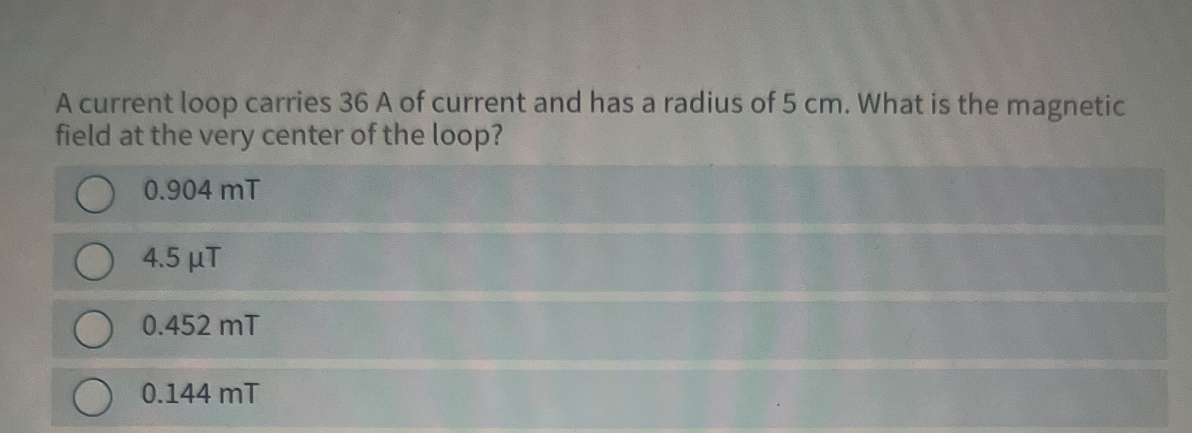Solved A current loop carries 36 ﻿A of current and has a | Chegg.com