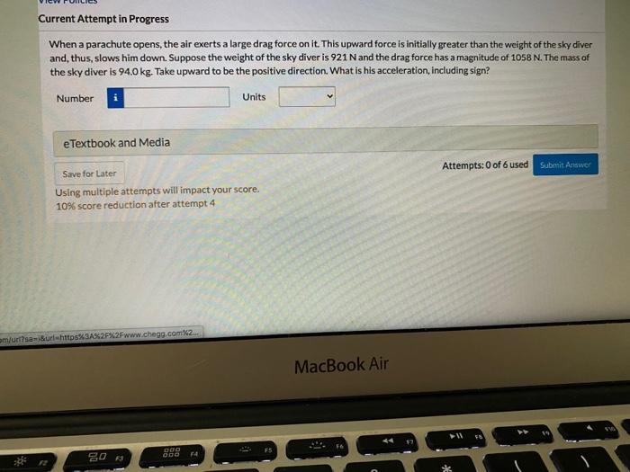 Solved Current Attempt in Progress When a parachute opens, | Chegg.com