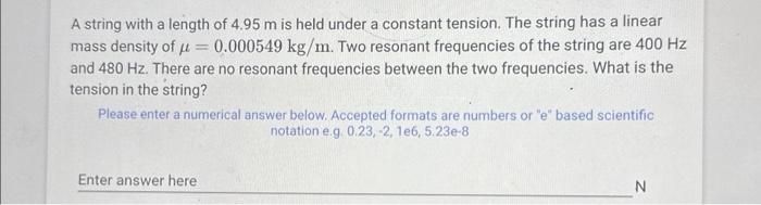 Solved One end of a string is attached to a rigid wall on a | Chegg.com