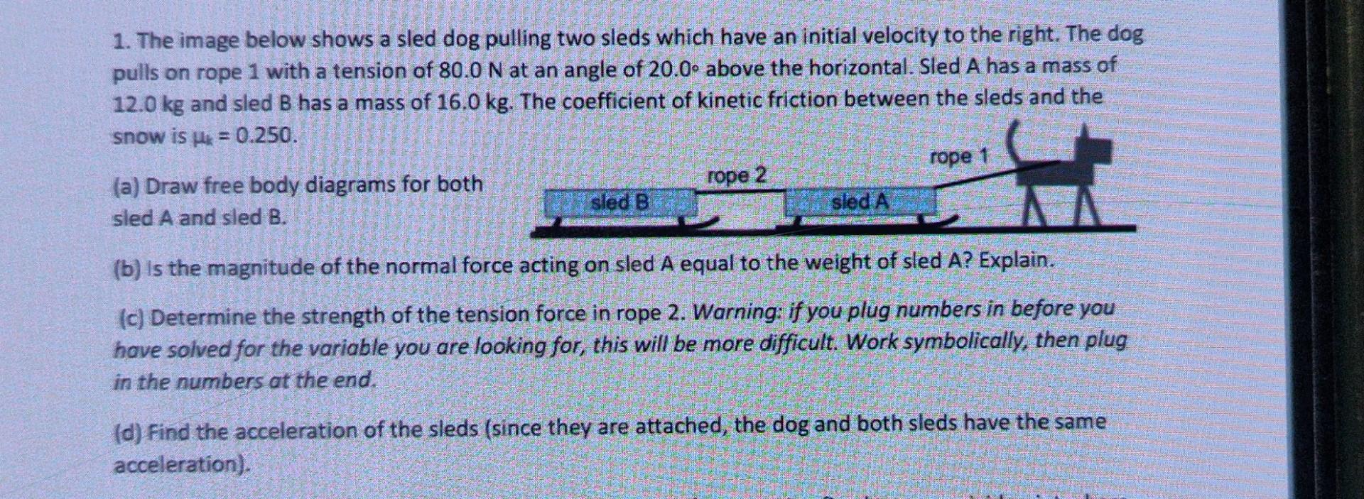 Solved 1. The image below shows a sled dog pulling two sleds | Chegg.com