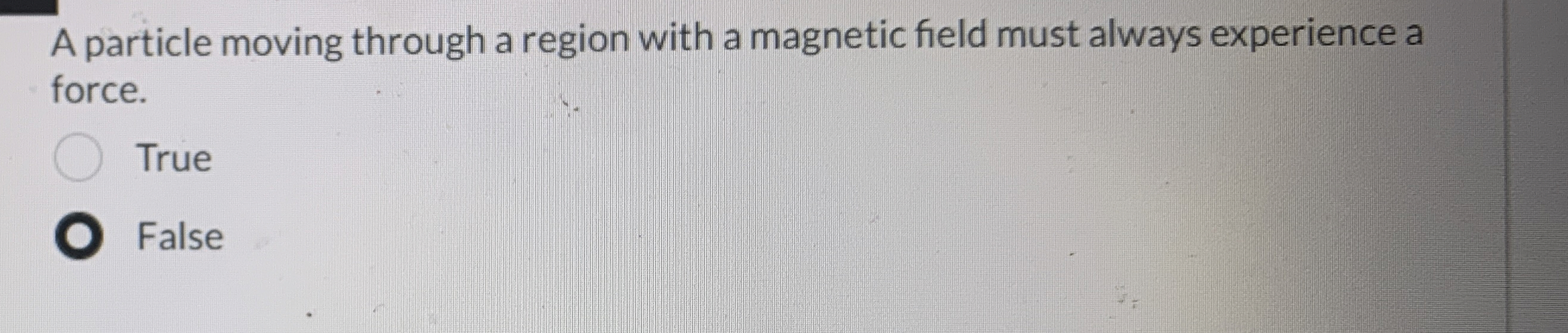 Solved A particle moving through a region with a magnetic | Chegg.com
