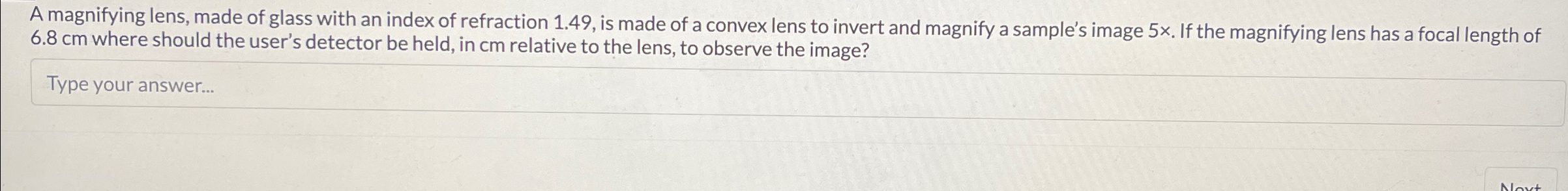 Solved A magnifying lens, made of glass with an index of | Chegg.com