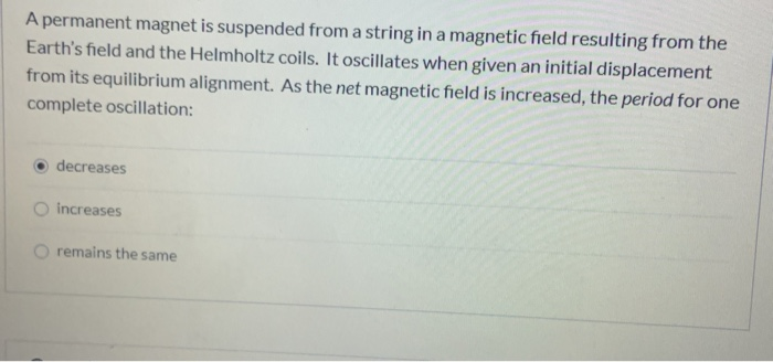 Solved A permanent magnet is suspended from a string in a | Chegg.com
