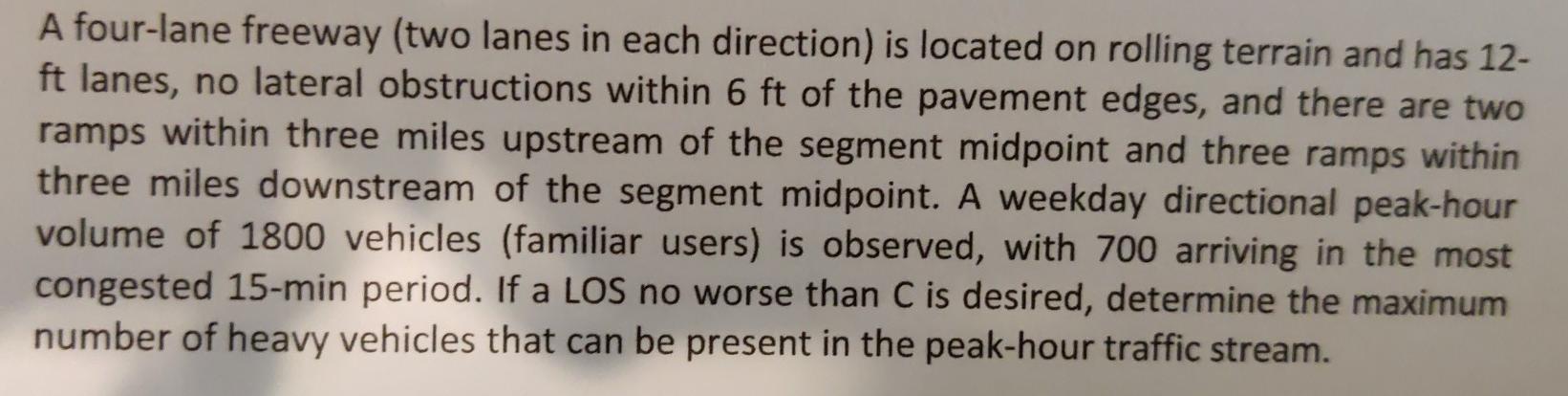 Solved A four-lane freeway (two lanes in each direction) is | Chegg.com