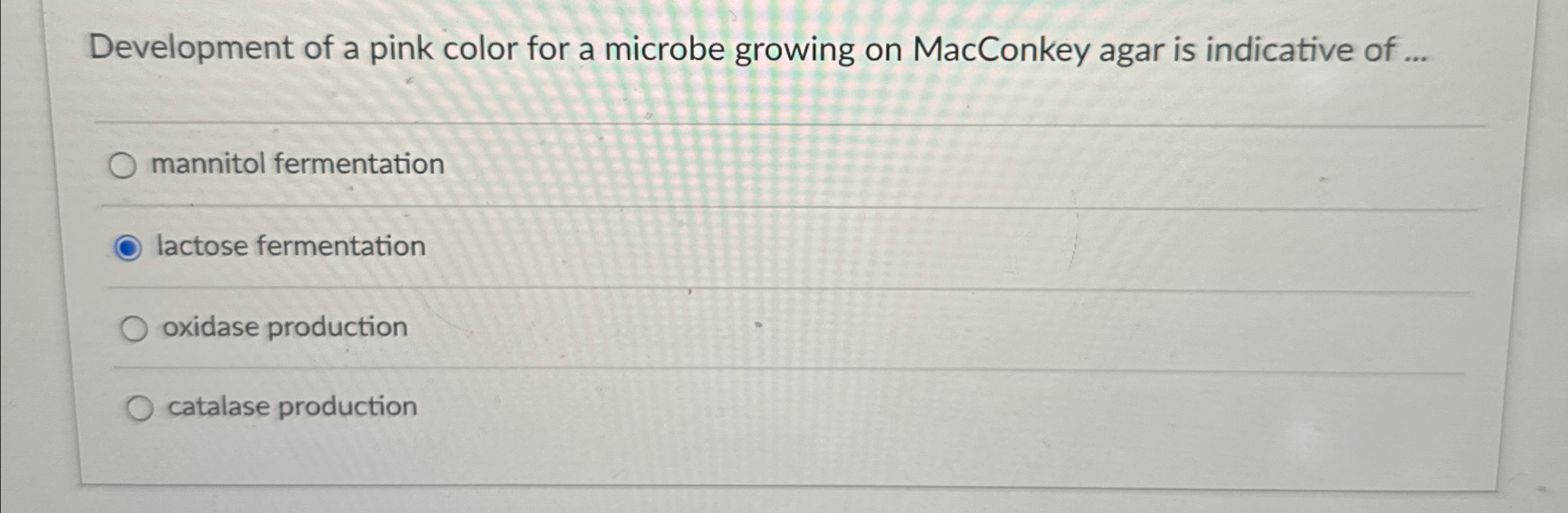 Solved Development of a pink color for a microbe growing on | Chegg.com
