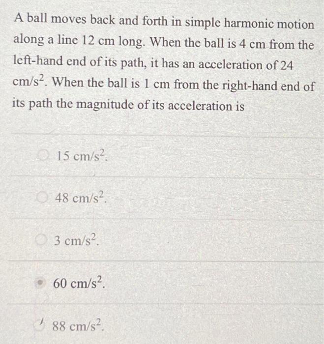 Solved A ball moves back and forth in simple harmonic motion | Chegg.com