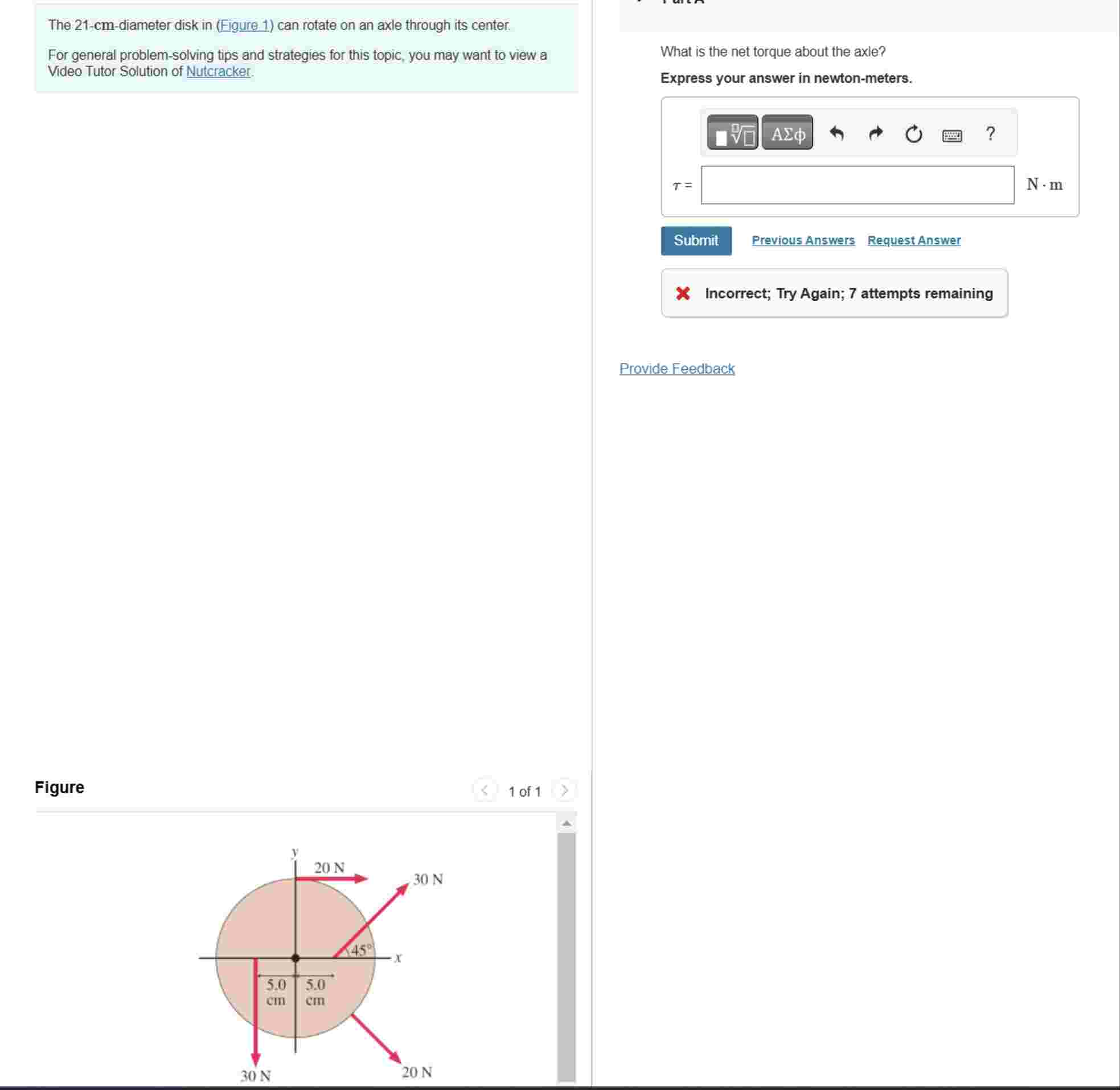The 21-cm-diameter disk in (Figure 1) ﻿can rotate on | Chegg.com