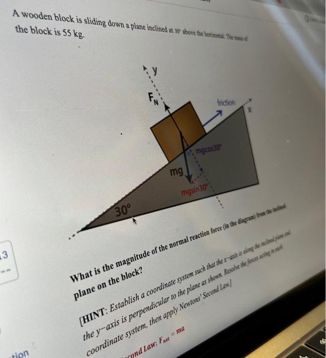 Solved A wooden block is sliding down a plane inclined at 30 | Chegg.com