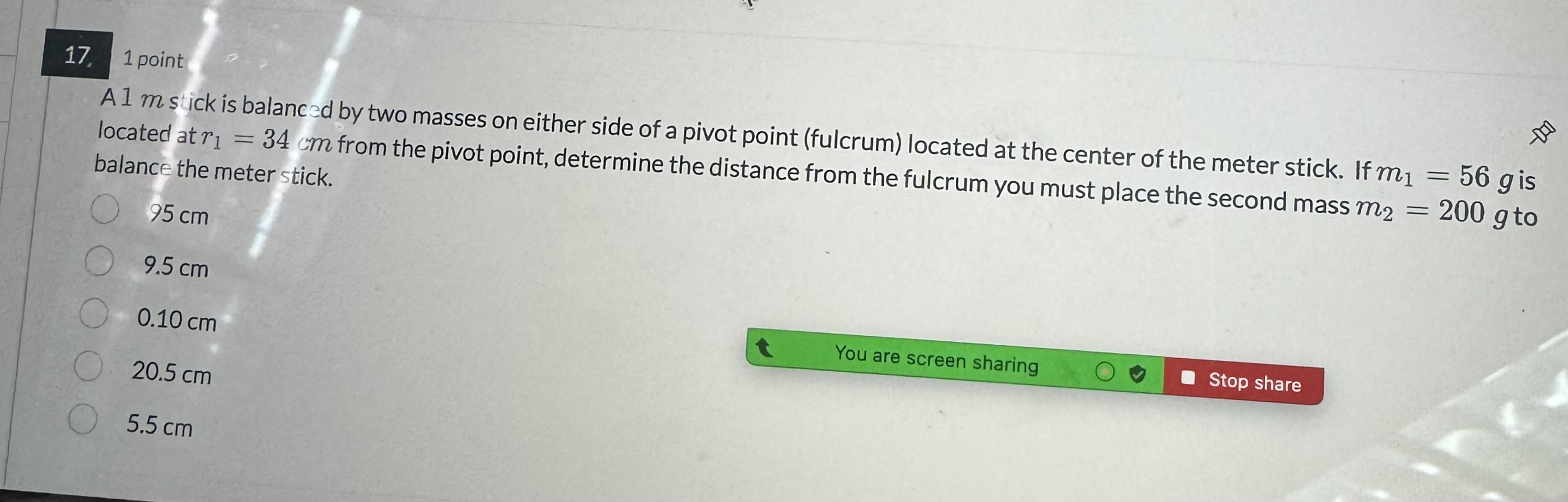 Solved 1 ﻿pointA 1m ﻿s ick is balanced by two masses on | Chegg.com