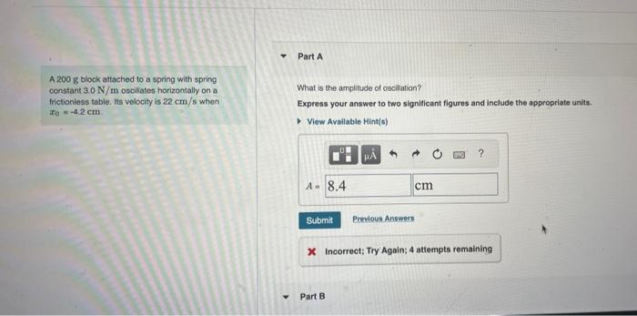 Solved A 200 g block attached to a spring with spring | Chegg.com