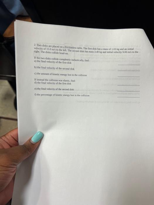 Solved 2. Two disks are placed on a frictionless table. The | Chegg.com