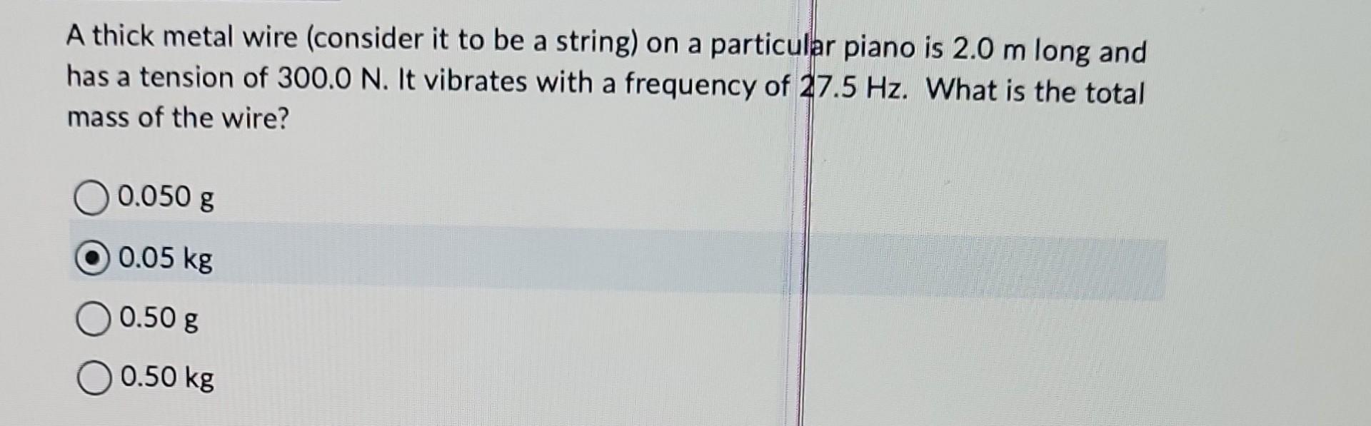 Solved A thick metal wire (consider it to be a string) on a | Chegg.com