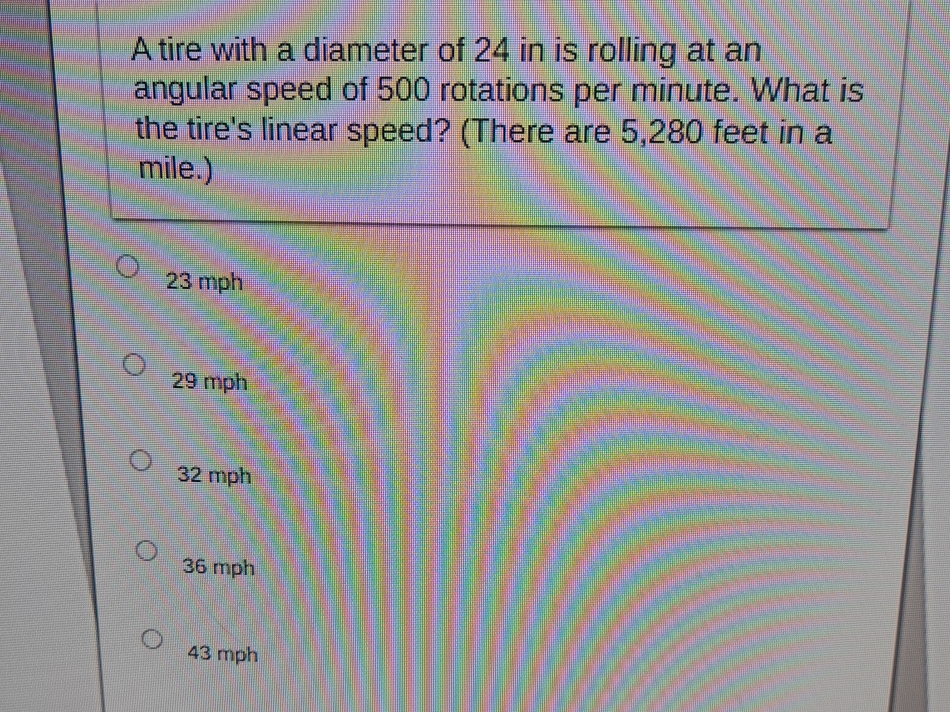 A tire with a diameter of 24 ﻿in is rolling at an | Chegg.com