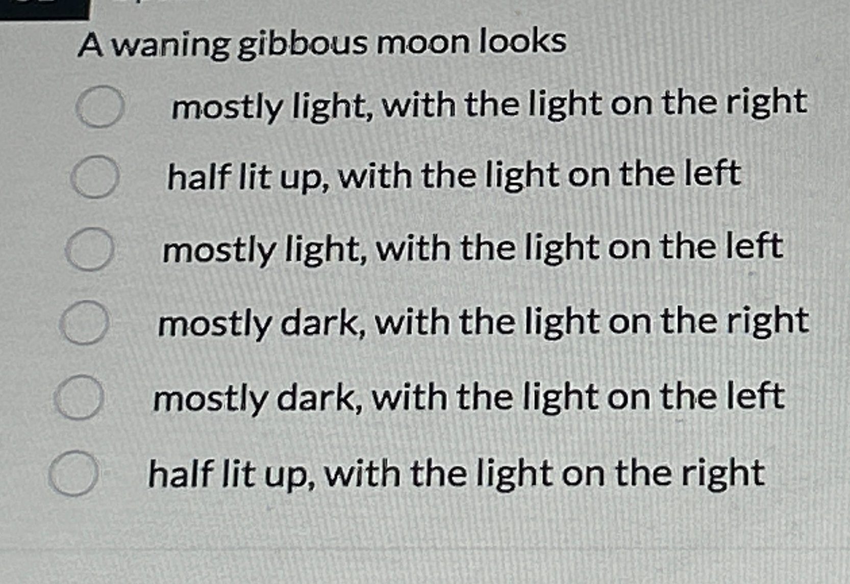 Solved A waning gibbous moon looksmostly light, with the | Chegg.com