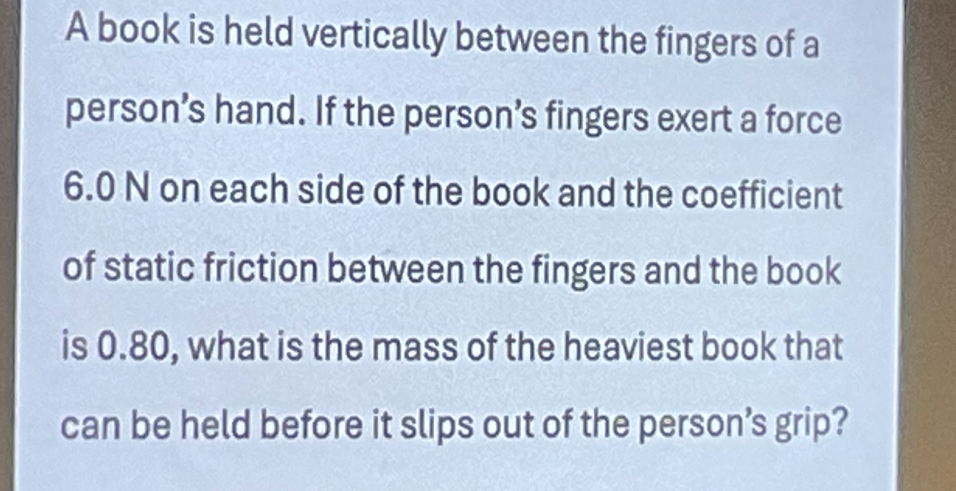 Solved A book is held vertically between the fingers of | Chegg.com