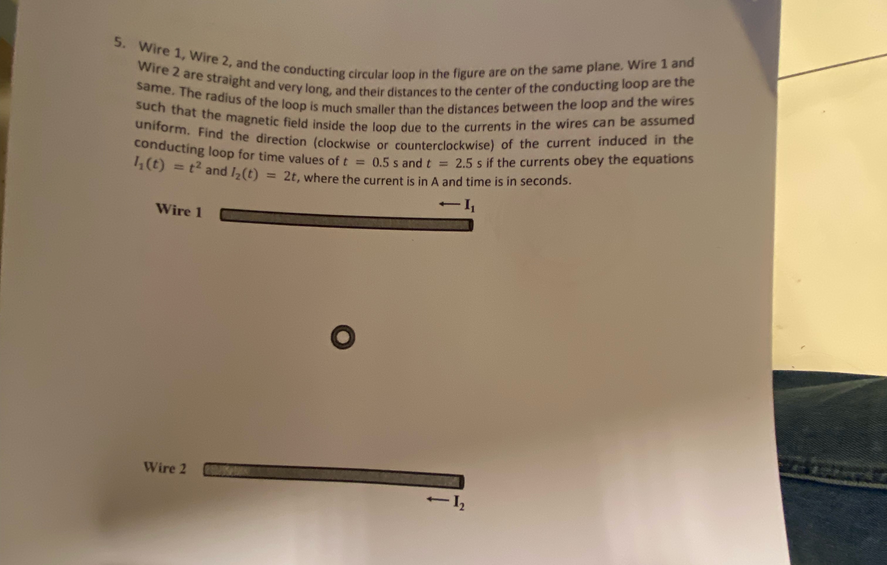 Solved Wire 1, ﻿Wire 2, ﻿and the conducting circular loop in | Chegg.com