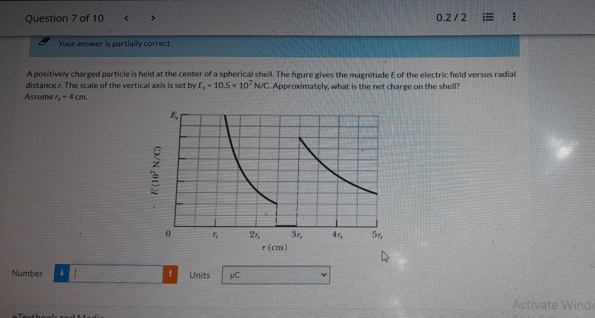 Solved A positively charged particle is held at the center | Chegg.com