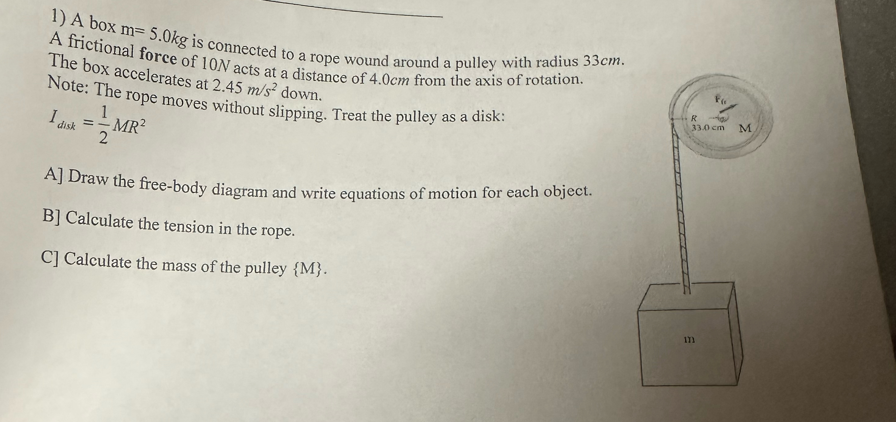 Solved A box m=5.0kg ﻿is connected to a rope wound around a | Chegg.com