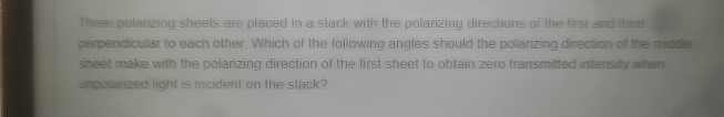 Three polarizing sheets are placed in a stack with | Chegg.com